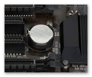 Помилка «CMOS checksum error - Defaults Loaded» при завантаженні